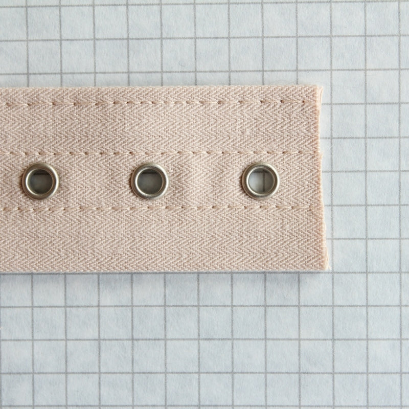 Lacing tape with bone channels & nickel eyes, beige